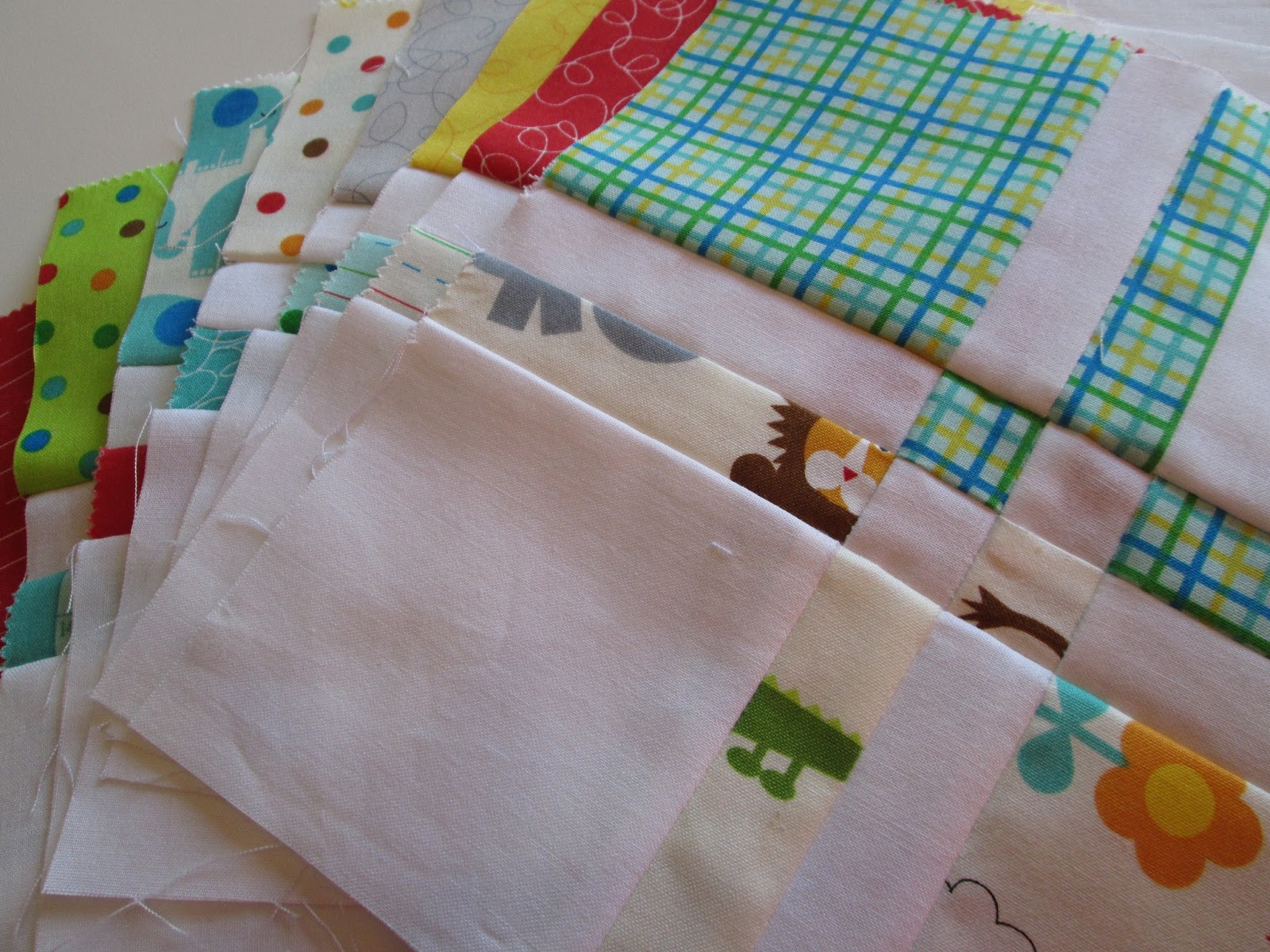 Stitch by Stitch: WIP Wednesday - Charm pack baby quilt and a tutorial