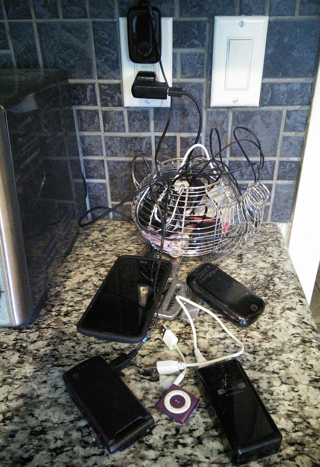 This mess of cords and having to wait to charge my device drives me crazy.