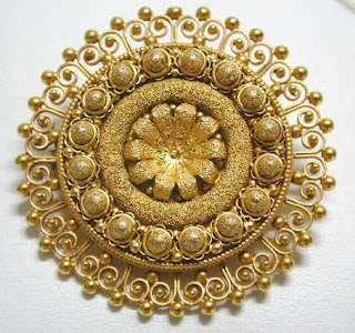 Golden brooch designs