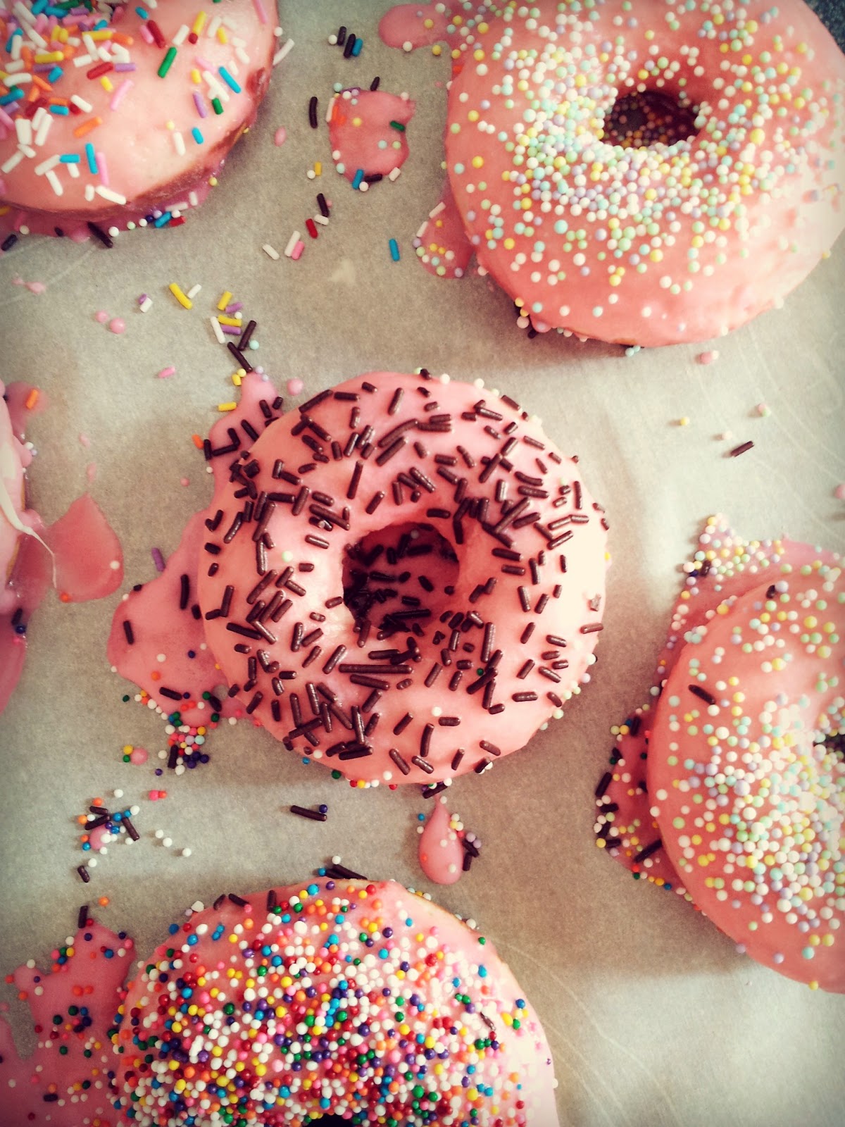 Feeding My Addiction: Perfectly Pink Baked Donuts with Vanilla Glaze