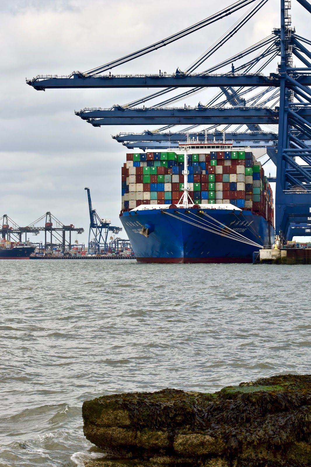CSCL Neptune departs after her 1st call to Port of Felixstowe. 2 ...