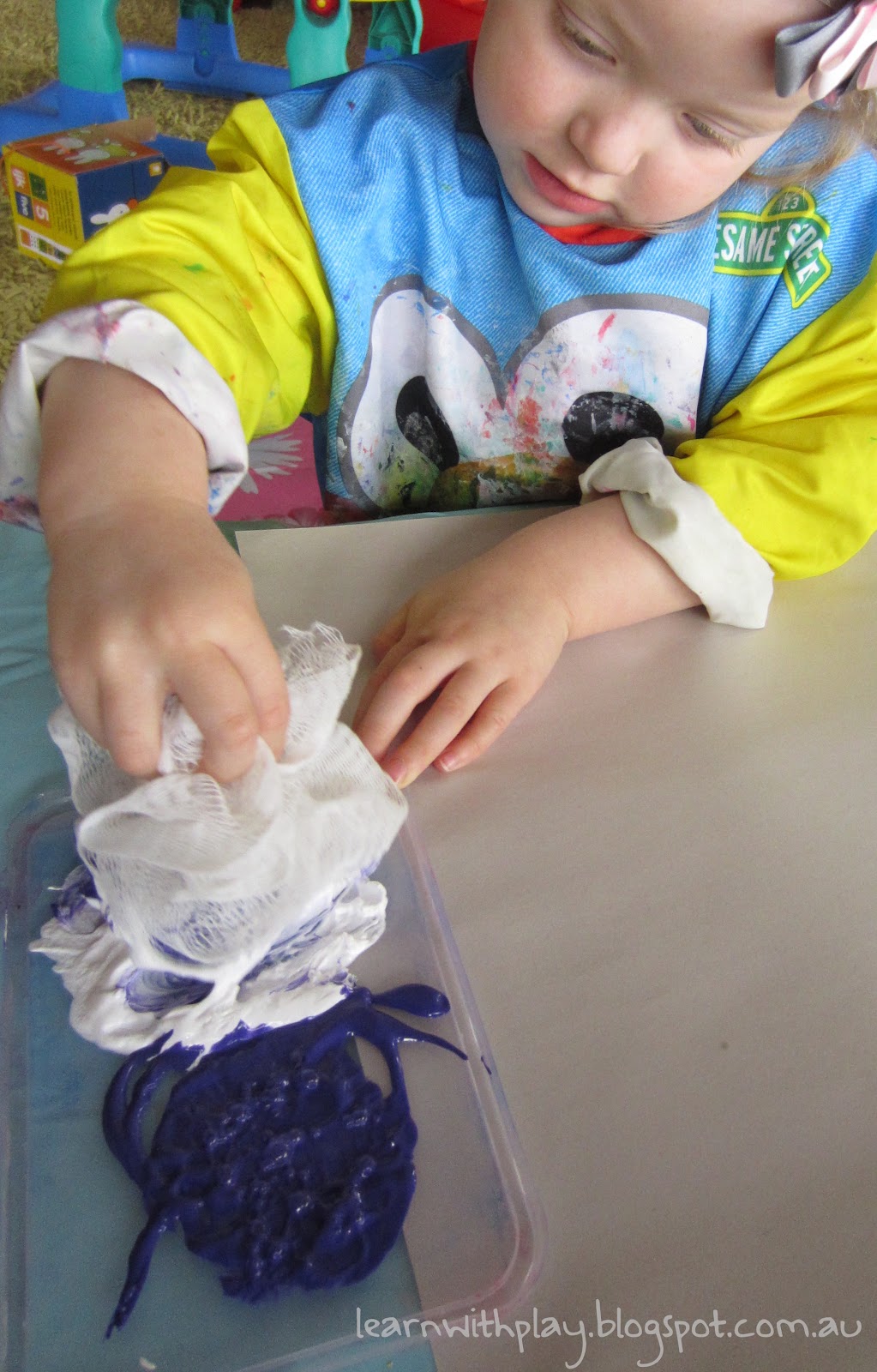 Learn with Play at Home: Shower Sponge Painting