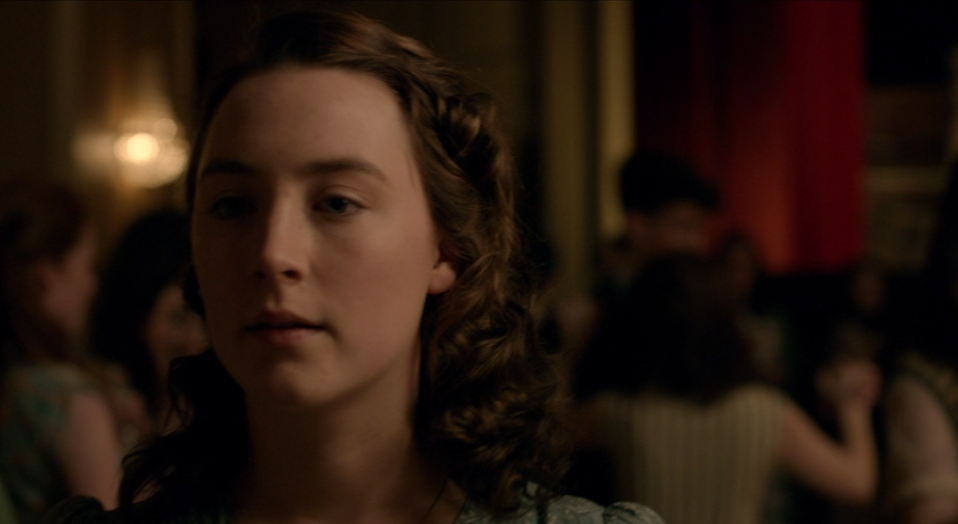 ...and purposely strides toward the door.