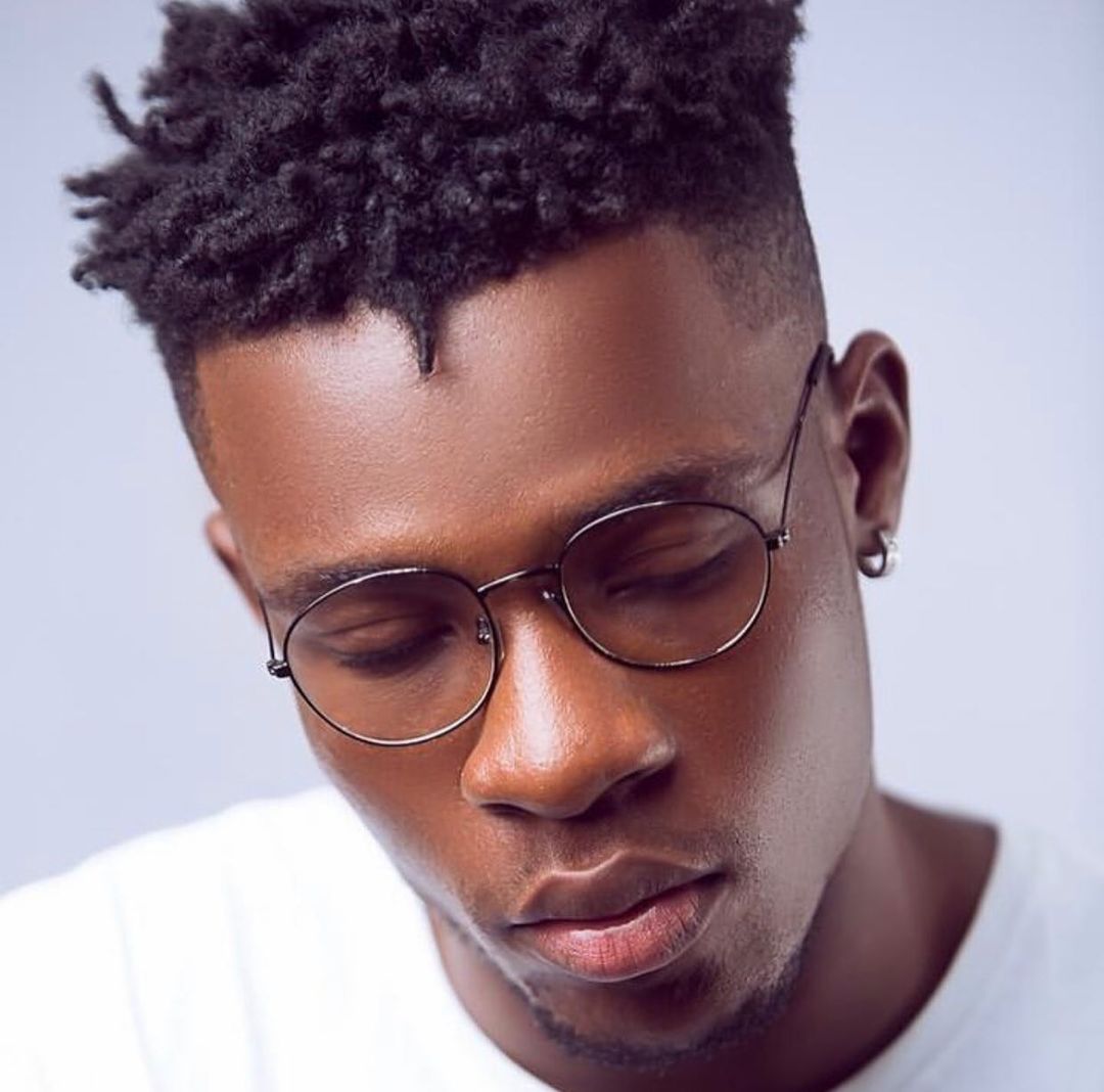 Hairstyle : Joeboy likes to wear stylish hair styles like dreads, braids.