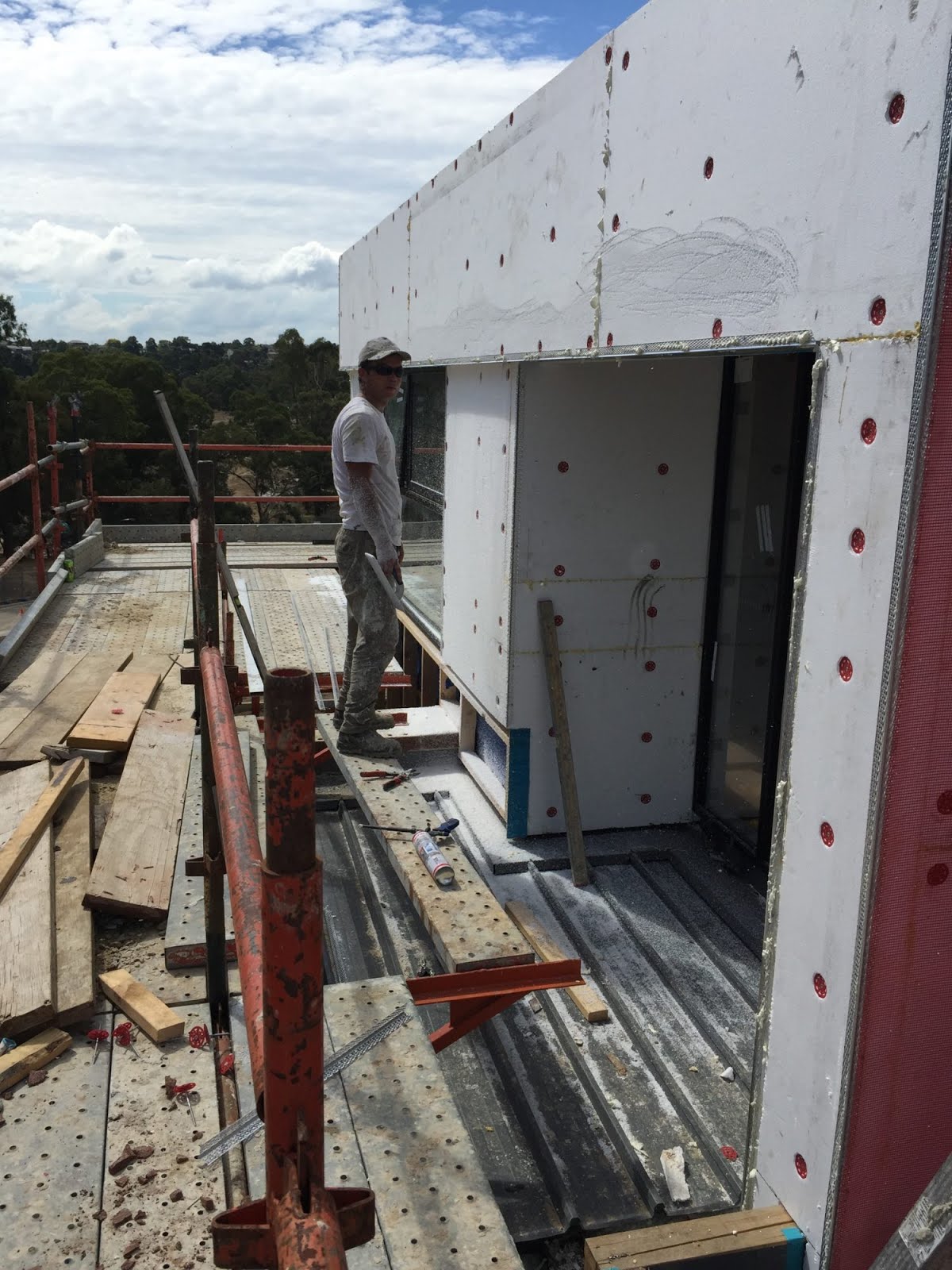 Rendering Services Melbourne: Install Hebel Party Wall Increasing the ...