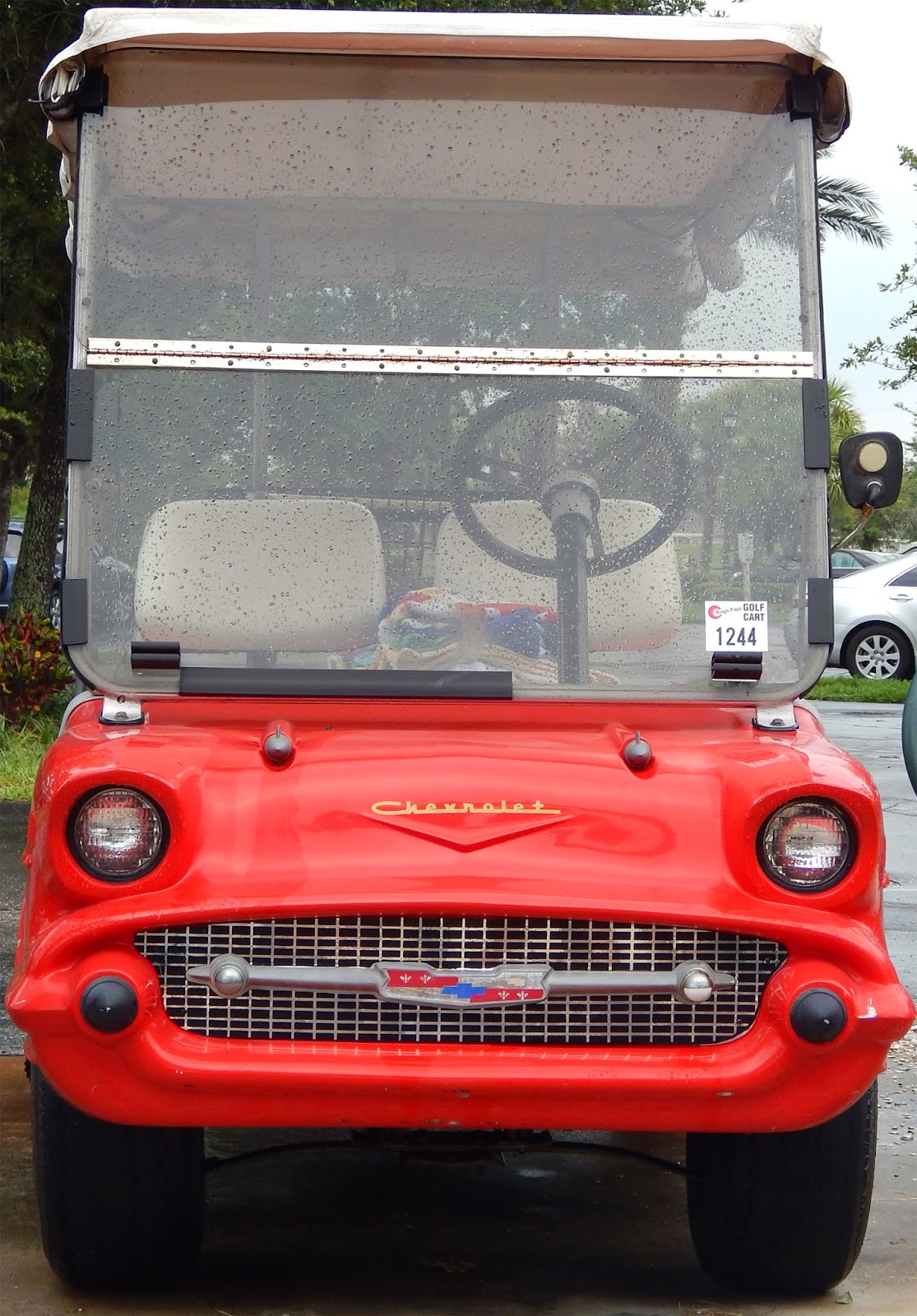Red 57 Chevy Bel-Air golf cart on Tomberlin frame, Sun City Center, FL