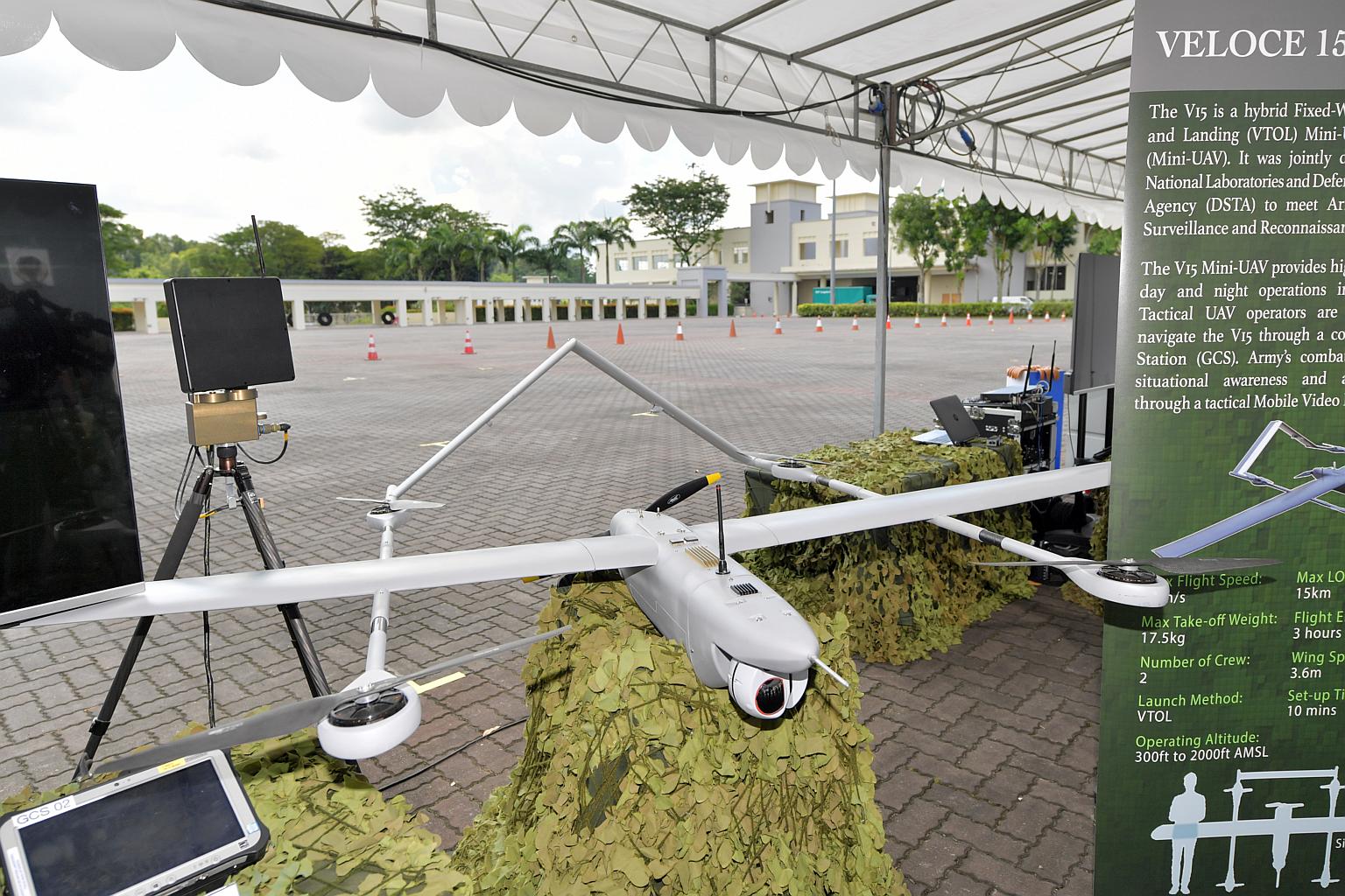 Singapore unveils new VELOCE 15 mini VTOL fixed wing Unmanned Aerial ...