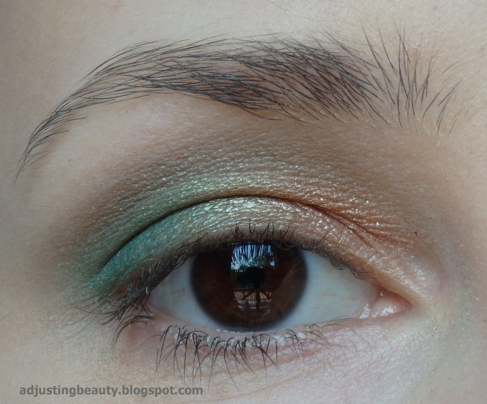 Warm/olive skin tones make up (copper, emerald, coral) - Adjusting Beauty