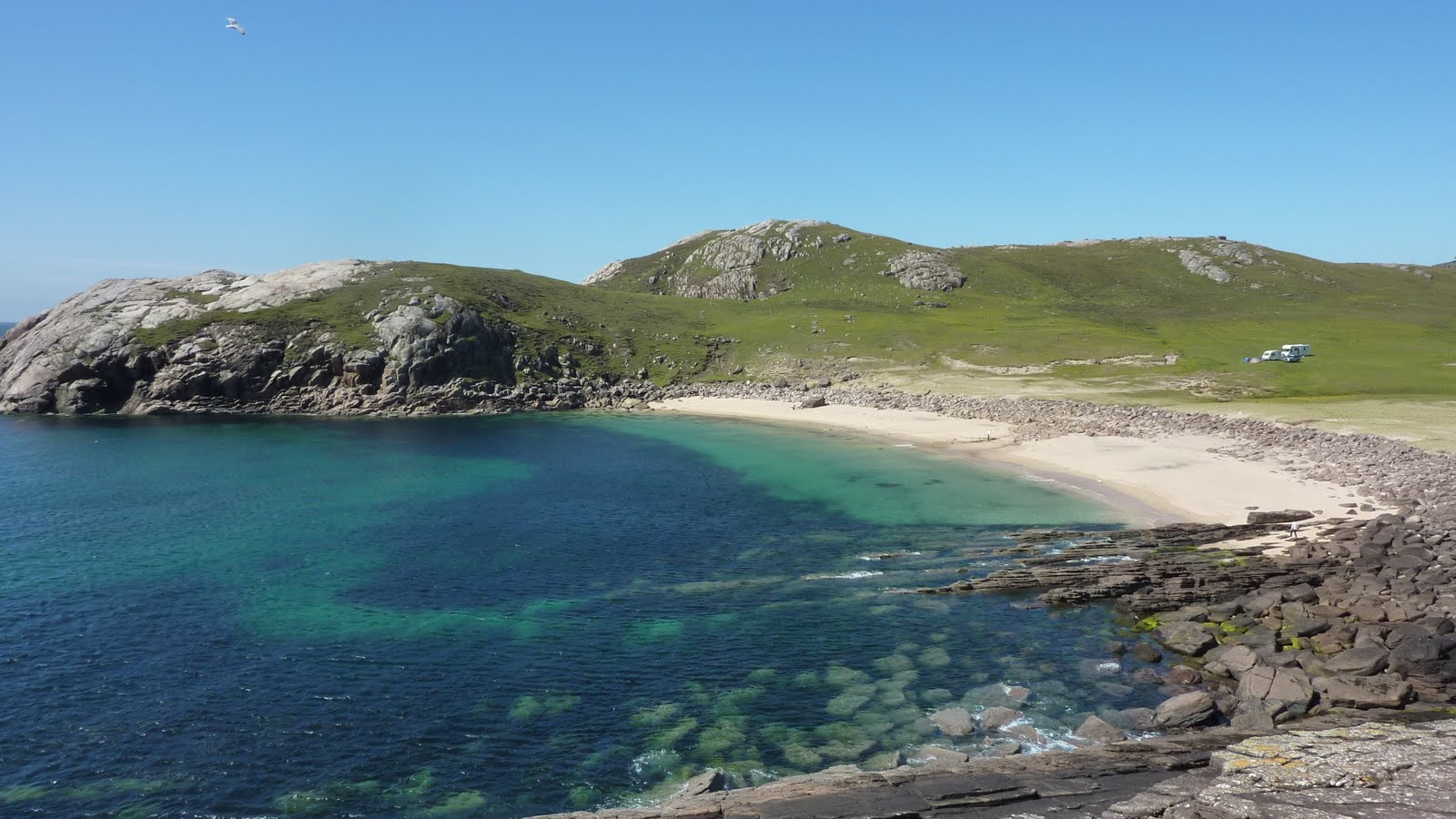 Am Bothan: Blue, cloudless skies, sparkling turquoise sea, empty golden ...