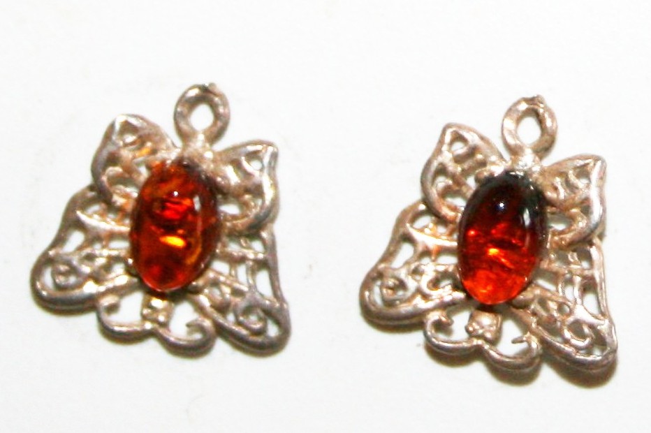 Ámbar del Báltico: Animales de ámbar y plata de ley.