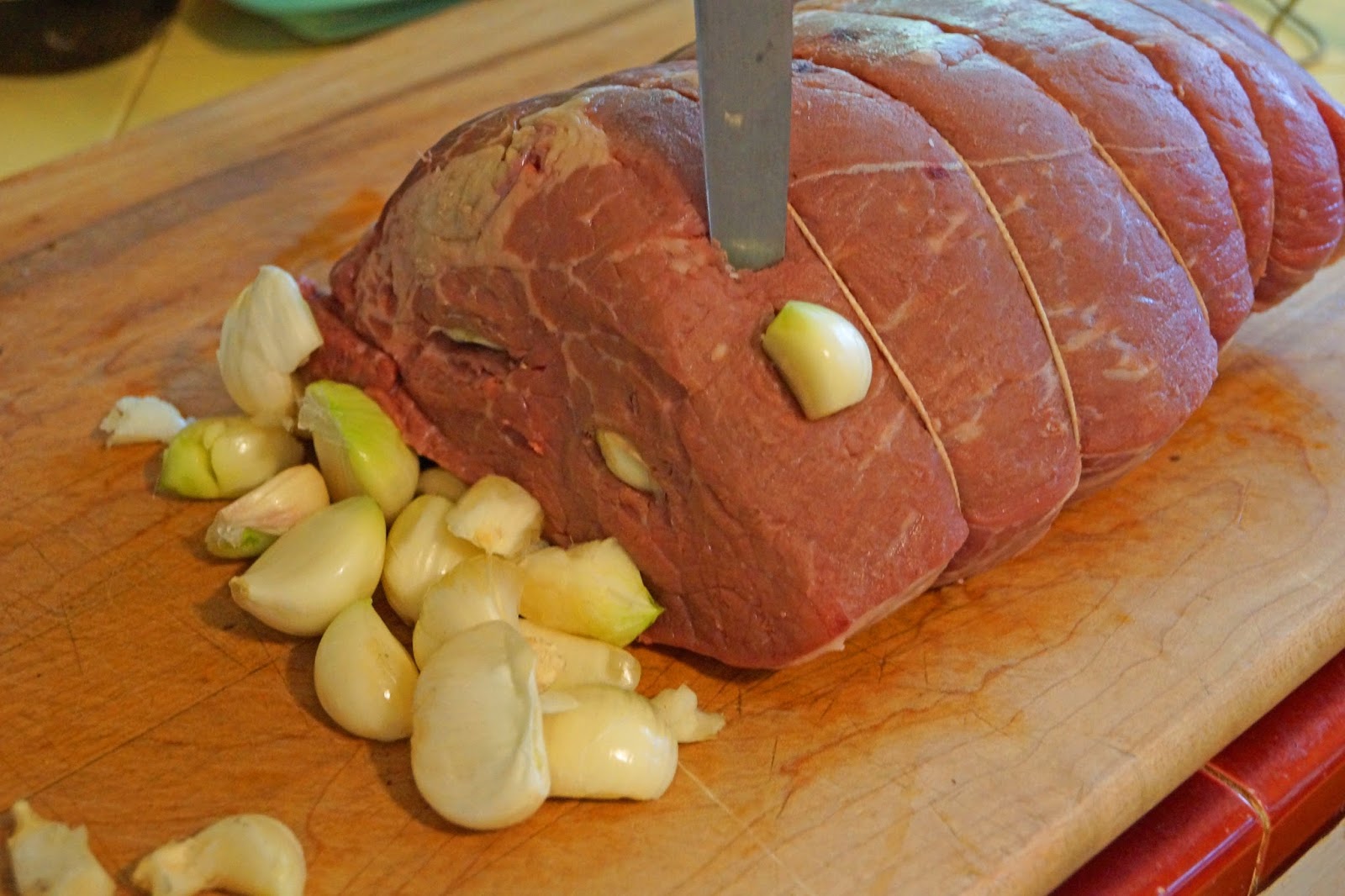 MAD MEAT GENIUS: HOME GROWN GARLIC STUDDED BEEF ROAST