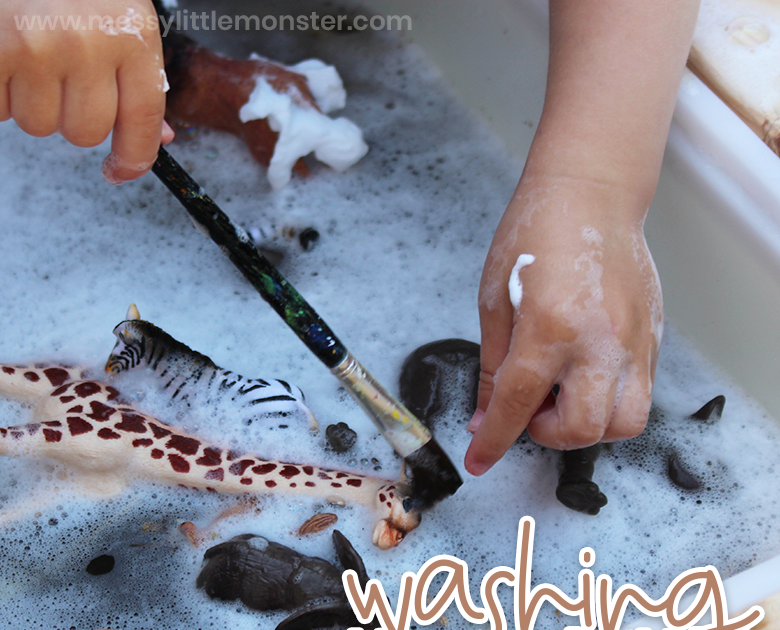 Washing Muddy Zoo Animals Sensory Bin for Toddlers - Messy Little Monster
