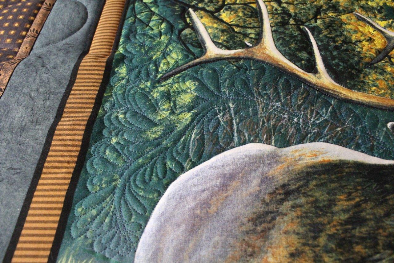 Sarah Lynn's Quilting: Half Done Quilting the Elk Panel Quilt