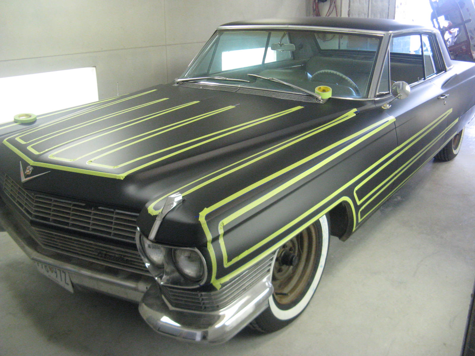 Pinstripe Chris: Custom paint on the Cadillac (aka Cattle Smack)