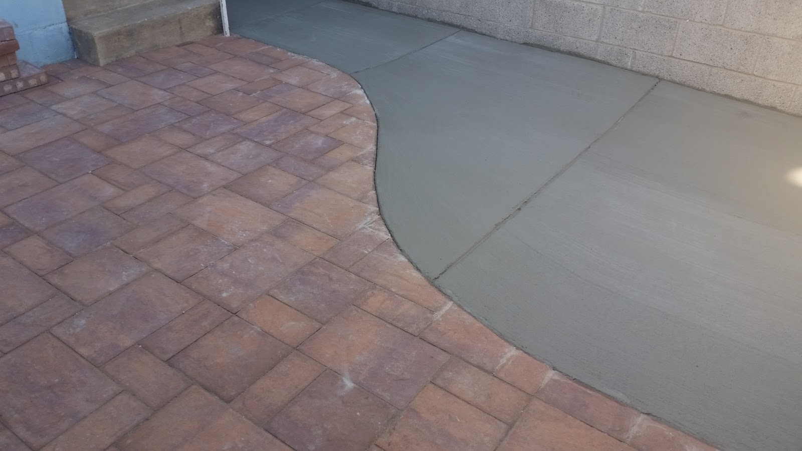 Custom Stoneworks & Design Inc.: Concrete and Paver patio combination