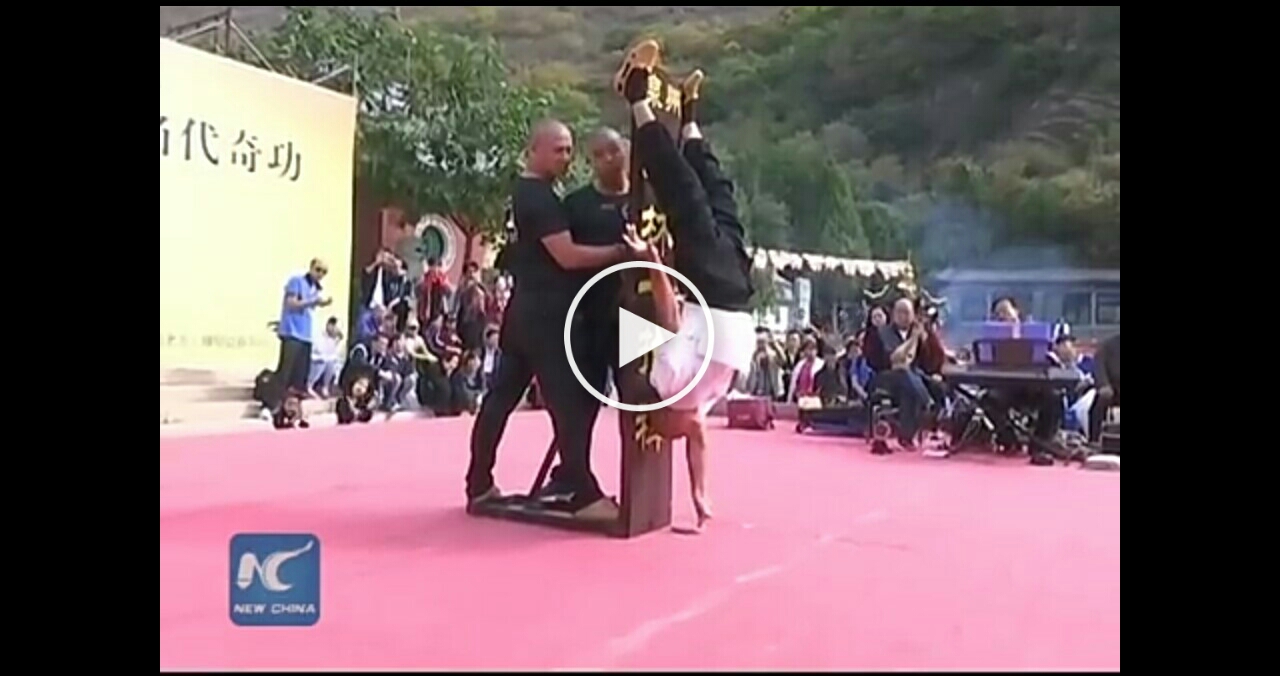 Amazing Shaolin monk stands on one finger - TNB