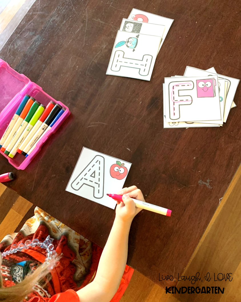 My girls were given these school themed letter tracing cards . Each ...