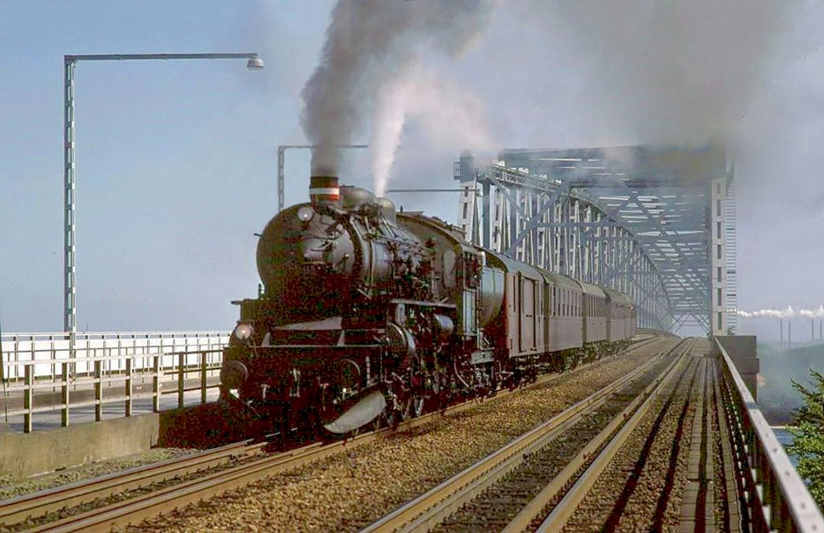 transpress nz: DSB E class 4-6-2 with a passenger train, Denmark, 1960s