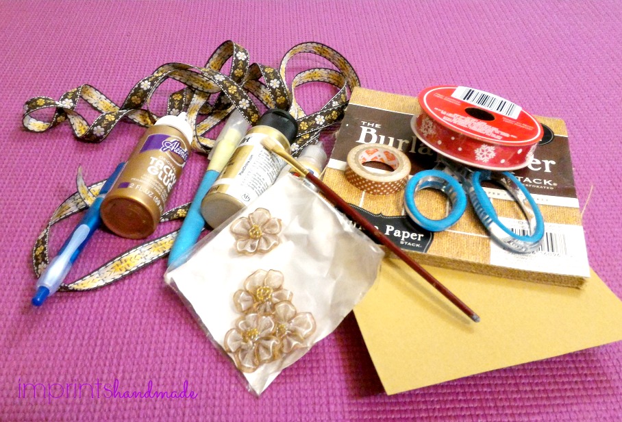 imprints handmade: Desktop paper clips stash with used ribbon spool: DIY