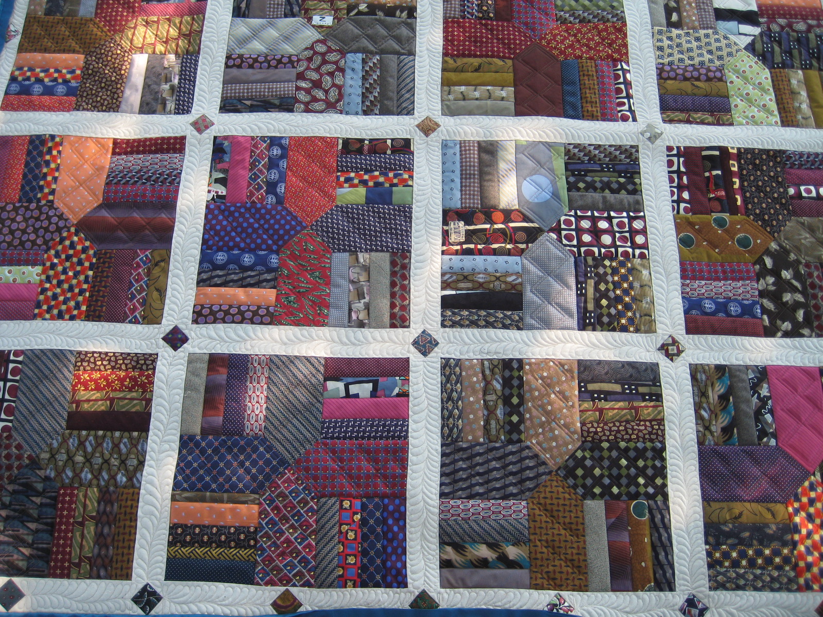 Threads on the floor: "David's Ties"