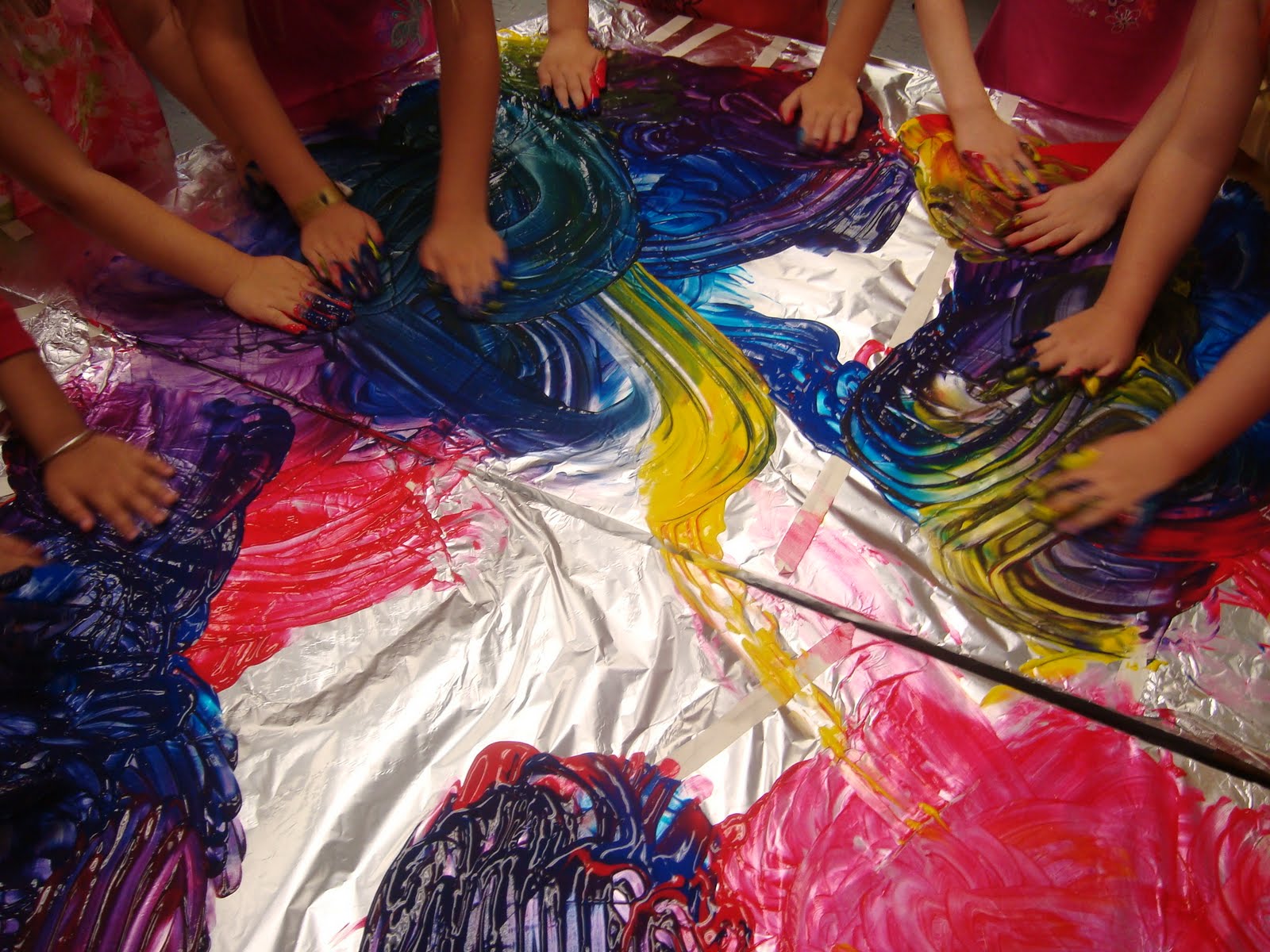 Joyful Learning in the Early Years: Finger Painting on Foil