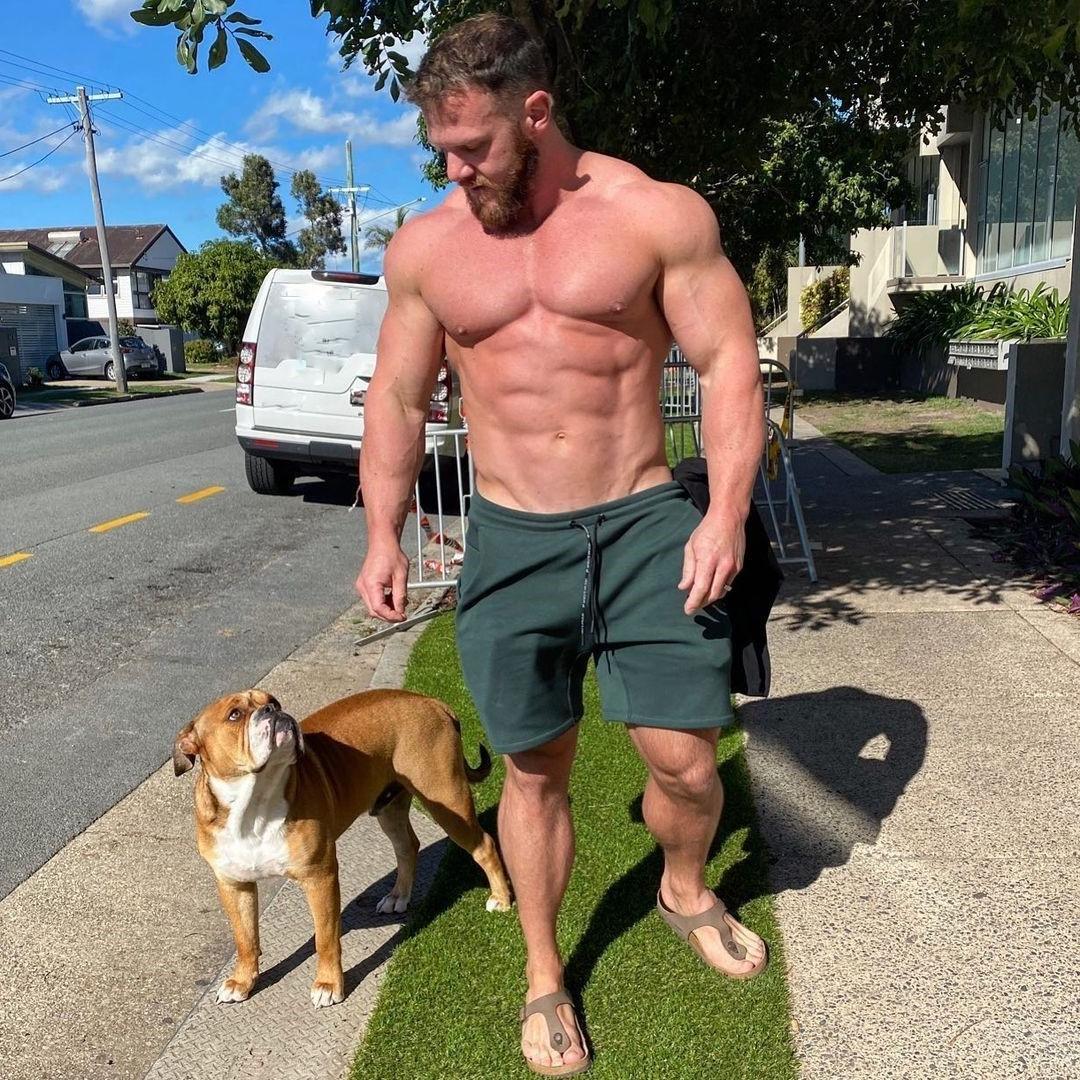 Strong bodybuilders with their dogs - GAYFRIENDSCHAT.com