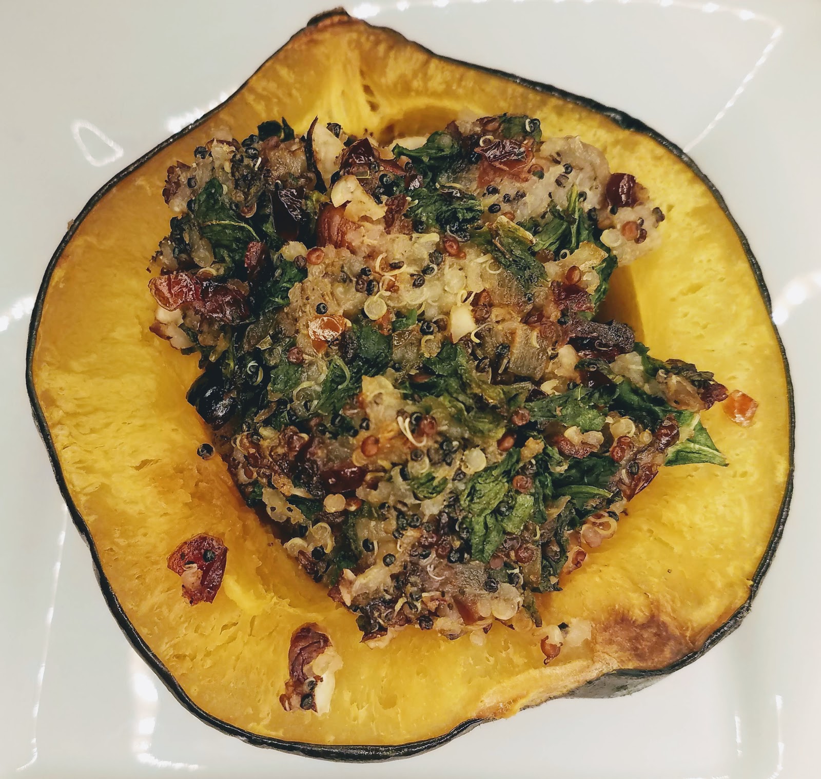 Stuffed Acorn Squash with Hazelnuts, Quinoa, and Kale