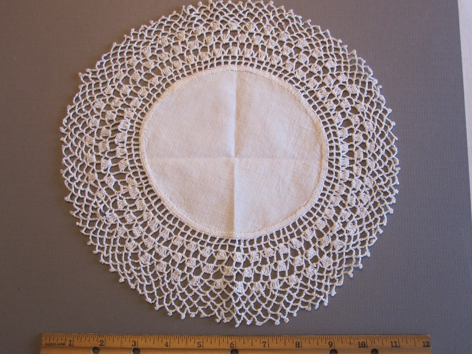 The Vandersall Attic: Item 22: Round lace doily with linen center.