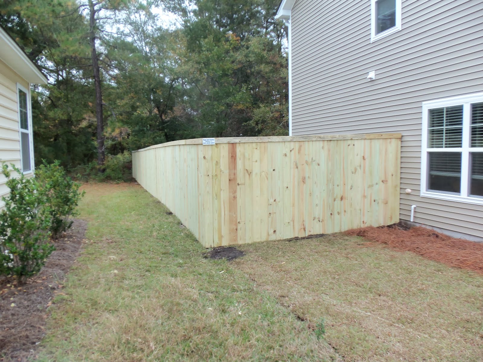 Town & Country Fences, LLC: 6' Treated Wood Privacy Fence with Trim Board