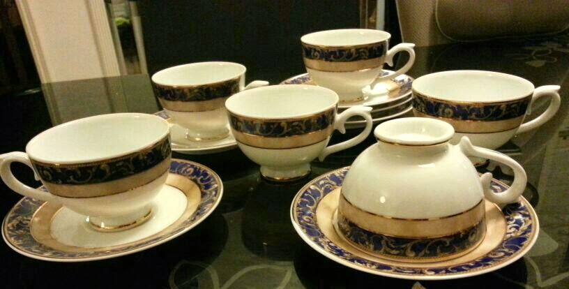 Evni's: Porcelein Gold Rimmed,Royal Blue tea Cup and Saucer Set
