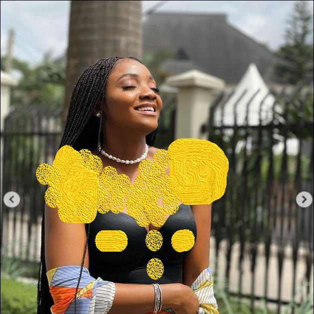 Singer Simi shares amazing new pictures spotting multi coloured emblem ...
