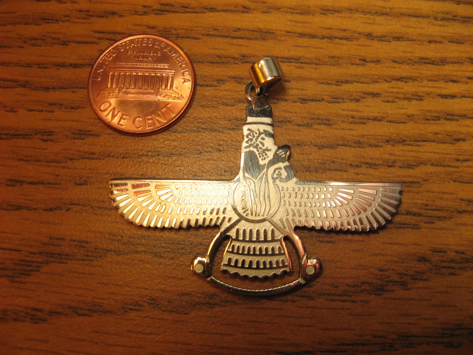 The Penny Exploit: Faravahar Pendant - Ancient Persian Symbol