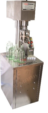 FILLING CAPPING LABELING MACHINES: Semi Automatic Lug Capping machine