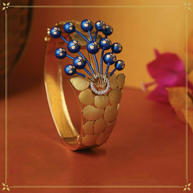 Golden broad bracelets