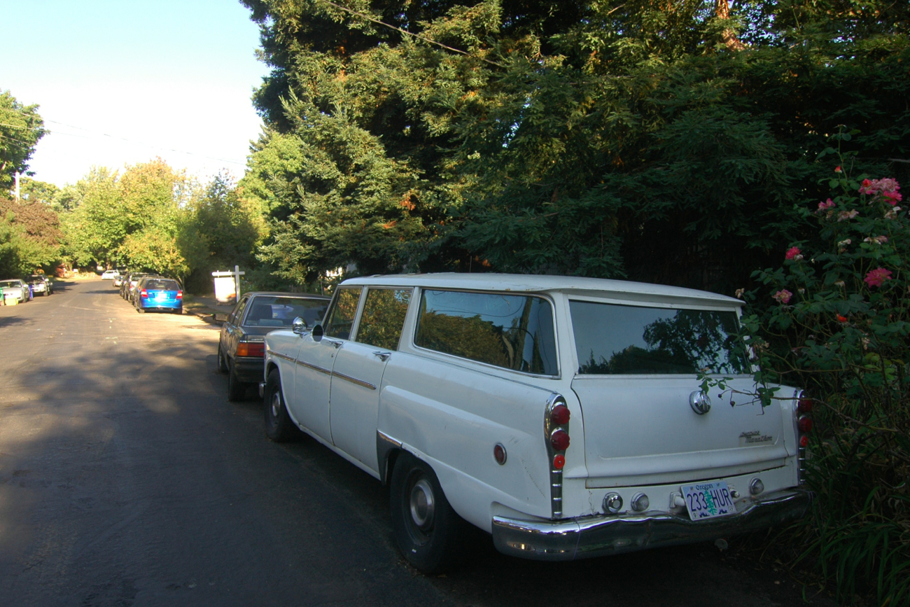 OLD PARKED CARS.: 1971 Checker Marathon Wagon.