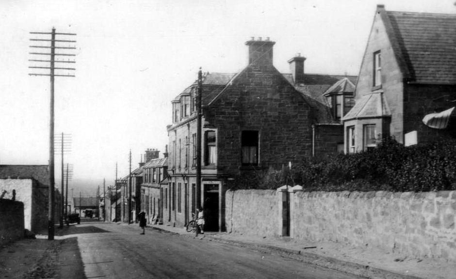 Tour Scotland: Old Travel Blog Photograph Harbour Street Hopeman Scotland