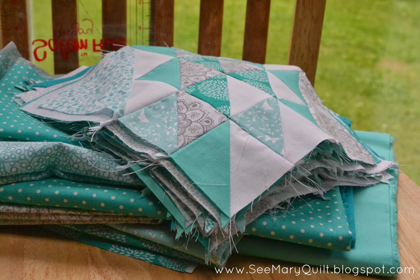 see mary quilt: Another Pyramid Scheme Quilt and a Pile of HSTs