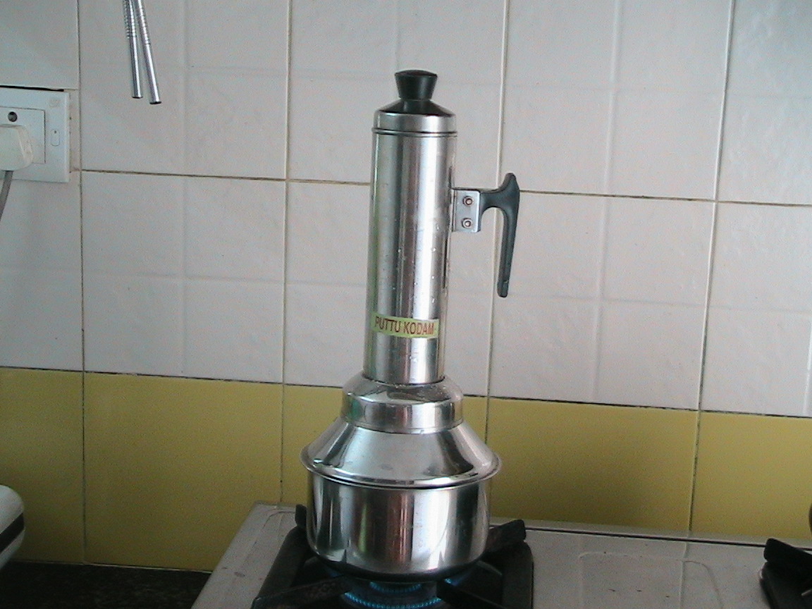 Close the puttu kutti and steam for 4-5minutes.