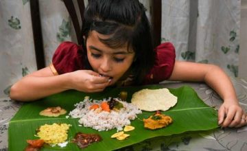 Indian traditional way of eating food with hands / fingers