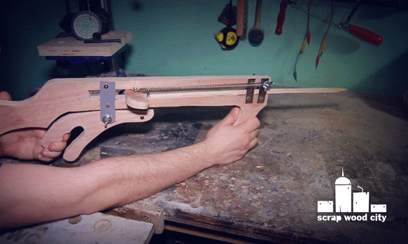 scrap wood city: DIY spring powered zombie apocalypse toy rifle
