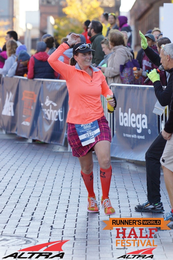 Erika high fiving Bart at this years RW Running Festival