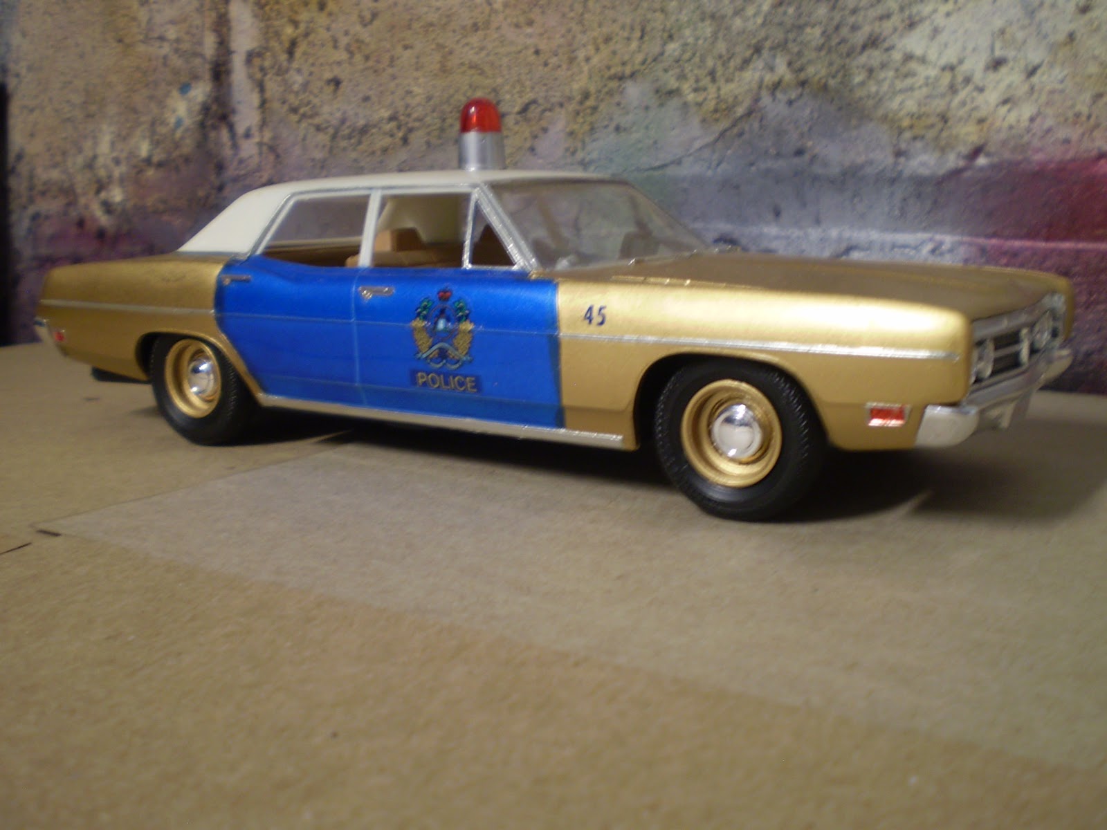 Barry Thomas’ “Wheel to Wheel”: Oct 9: Model Police Cars and a Cat