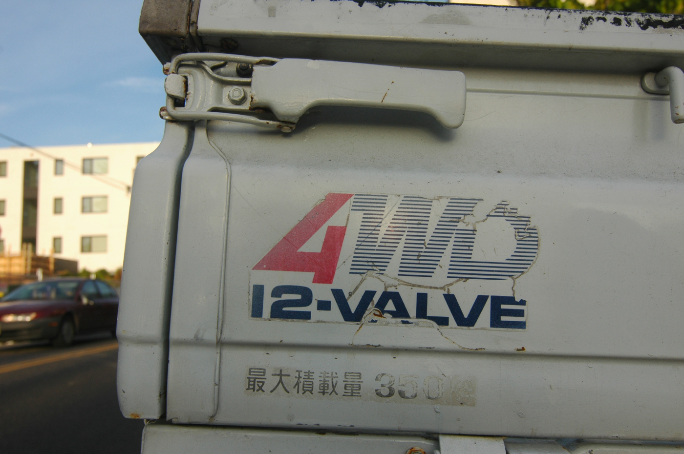 OLD PARKED CARS.: 1991 Autozam Scrum Truck.