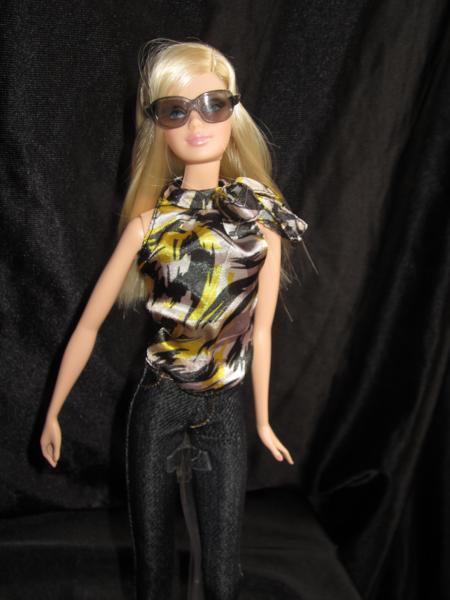 BARBIE SARAI: TIM GUNN DOLL 1