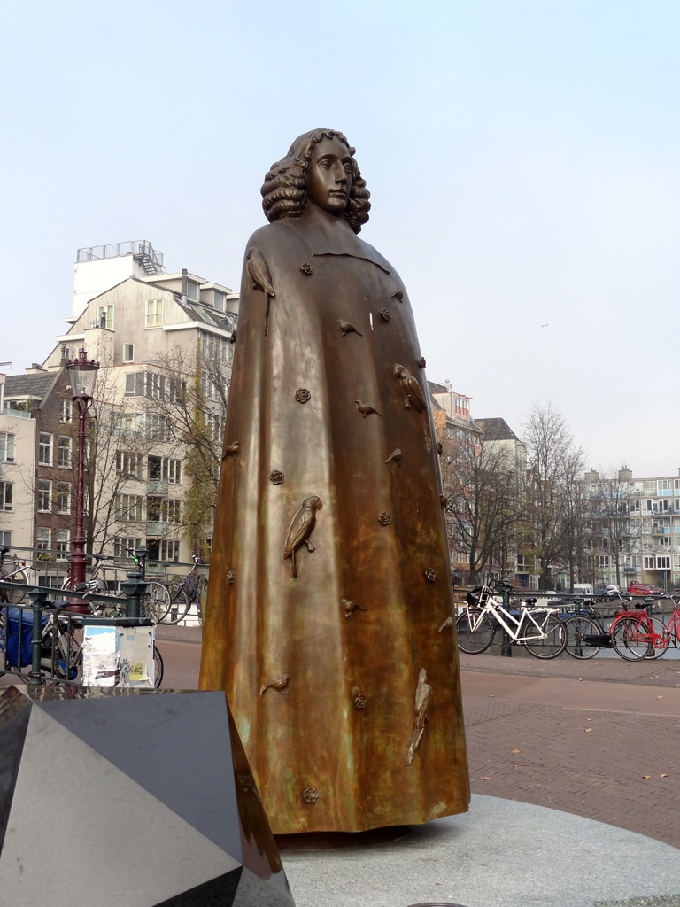 Kiwi's Angels: Statue of Spinoza with parrots in Amsterdam