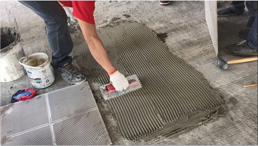 BUILDER'S JOURNAL: TILE INSTALLATION: NOTCHED TROWEL COMB TECHNIQUE