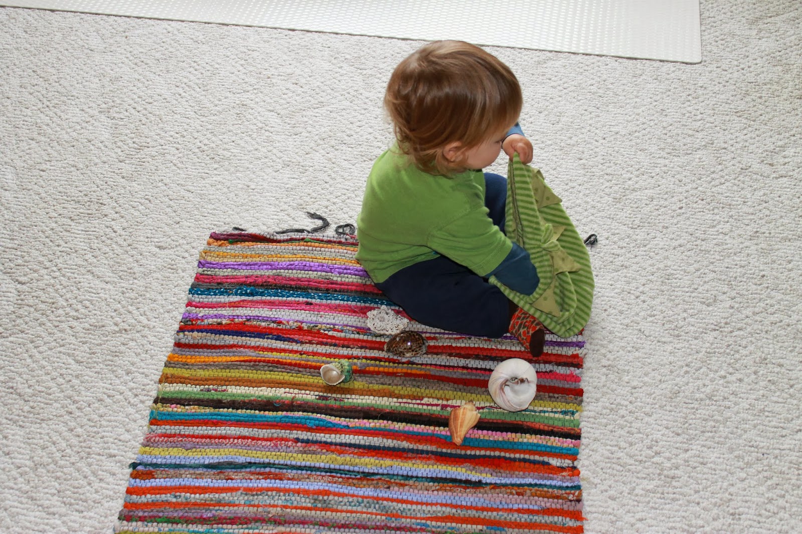 Montessori Beginnings: Montessori Shelves and Using a Work Mat
