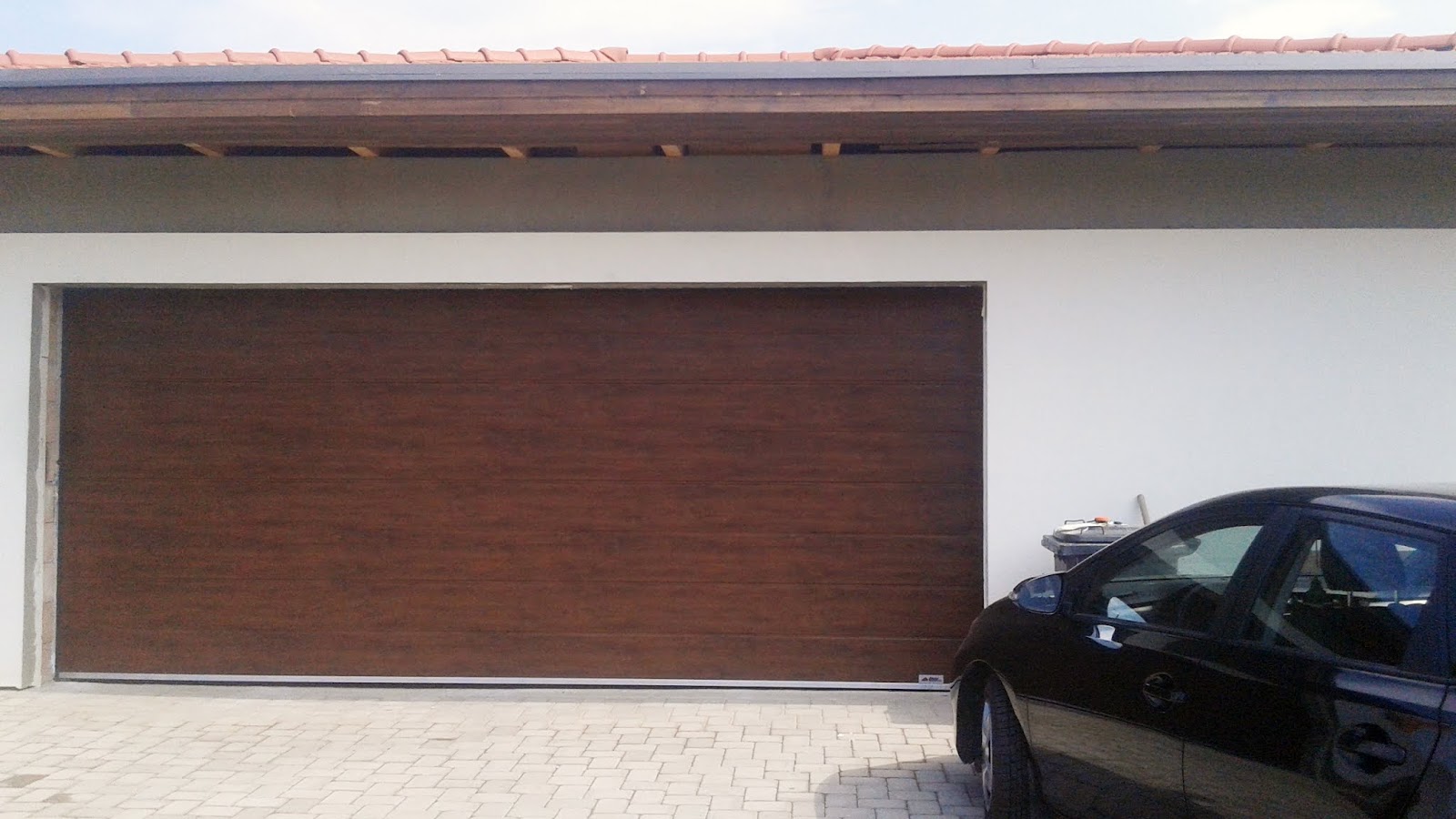 Usi de garaj sectionale comercializate de GateMaster. Cum intretinem o ...