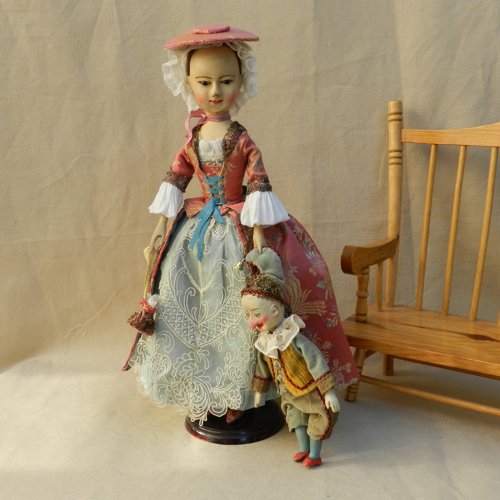 The Old Wooden Sisters: Queen Anne doll and Royal court fool )