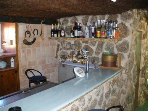 sientase comodos: barra de bar y barbacoa